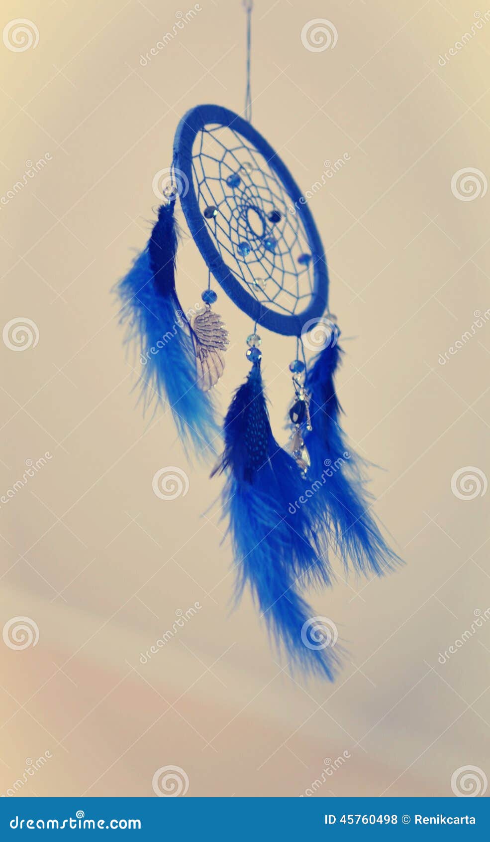 Blue Dream Catcher Hanging on a Light Background Stock Photo - Image of ...
