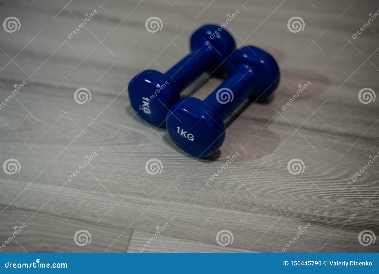 Blue Dumbbells on the Floor Stock Photo - Image of health, club: 150445790