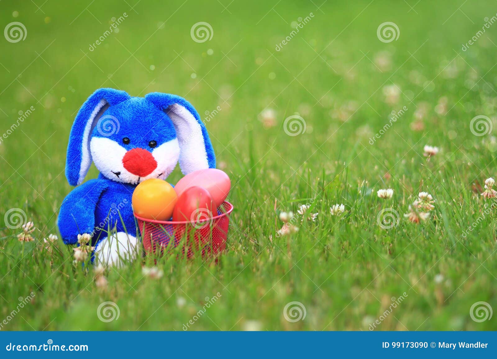 Blue Easter Bunny with Basket of Easter Eggs Stock Photo - Image of ...