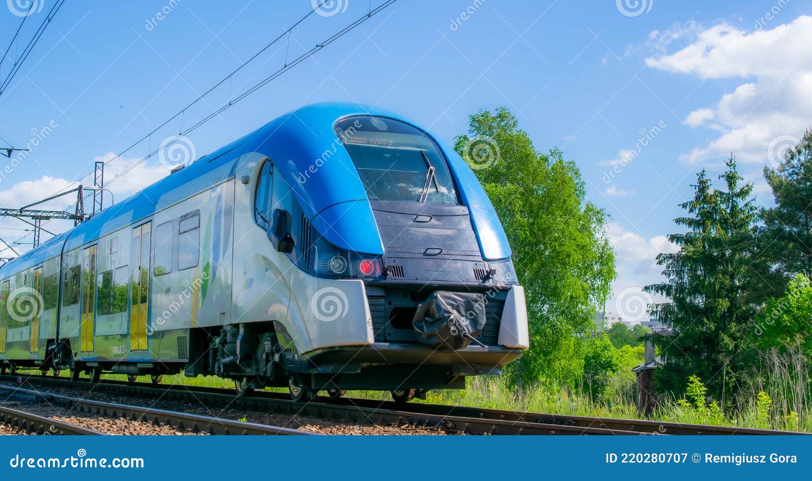 Blue Eco Train on the Tracks Stock Image - Image of station, blue ...