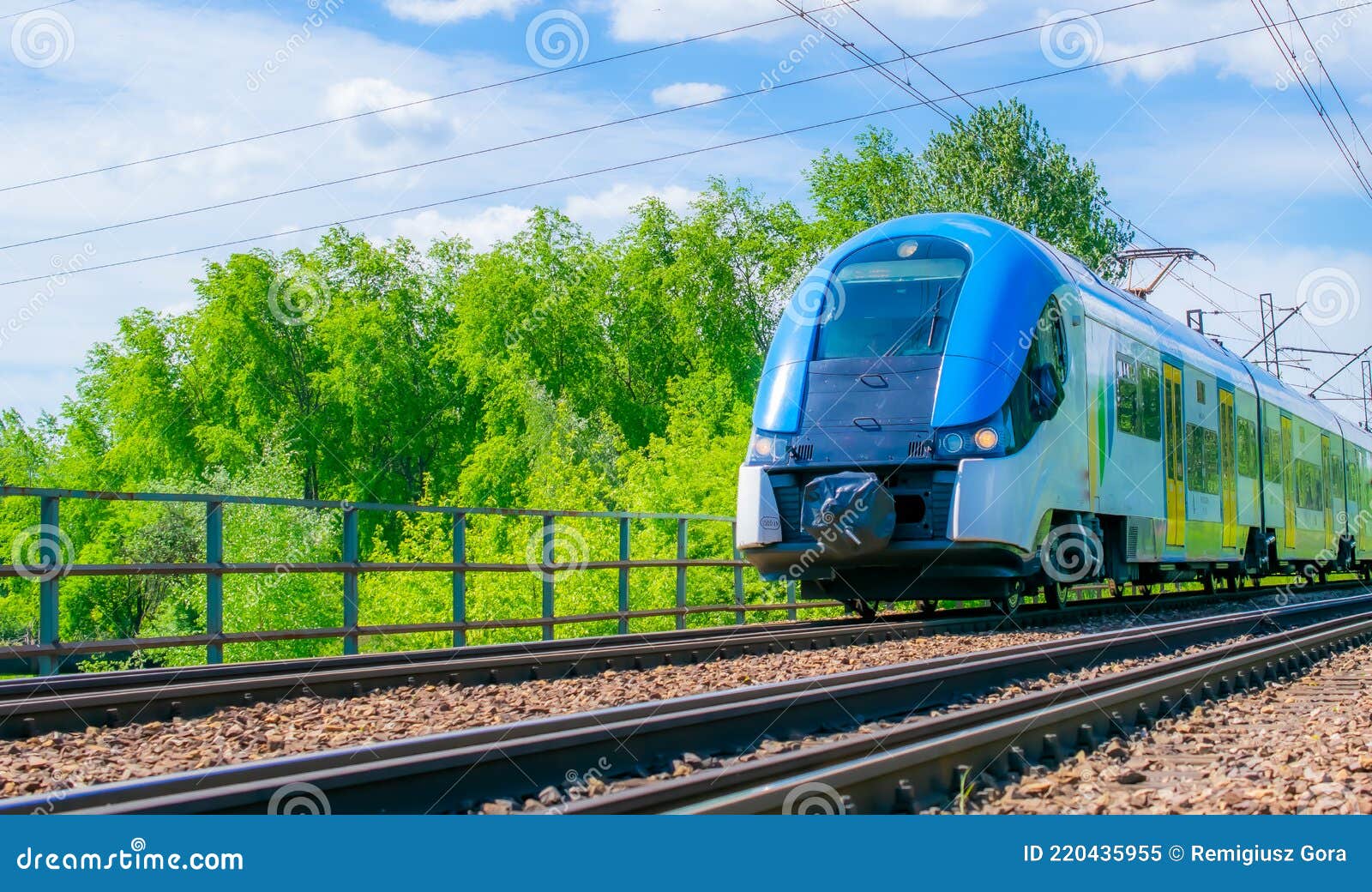 Blue Eco Train on the Tracks Stock Image - Image of travel, tracks ...
