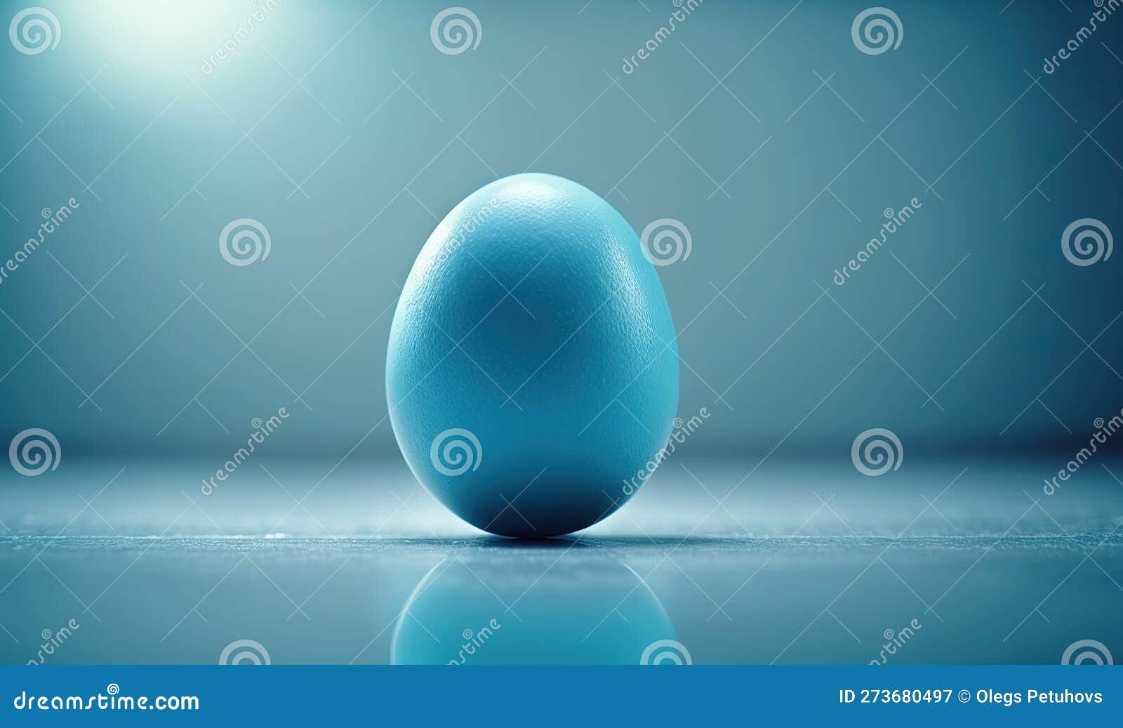A Blue Egg Sitting on Top of a Blue Table Top Next To a Light Blue Wall ...