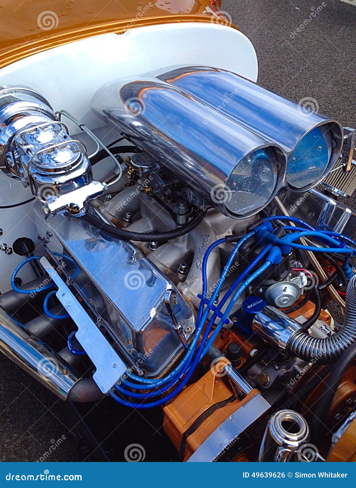 The Exposed Engine Of A Powerful Blue Dragster Racing Car Glinting In ...