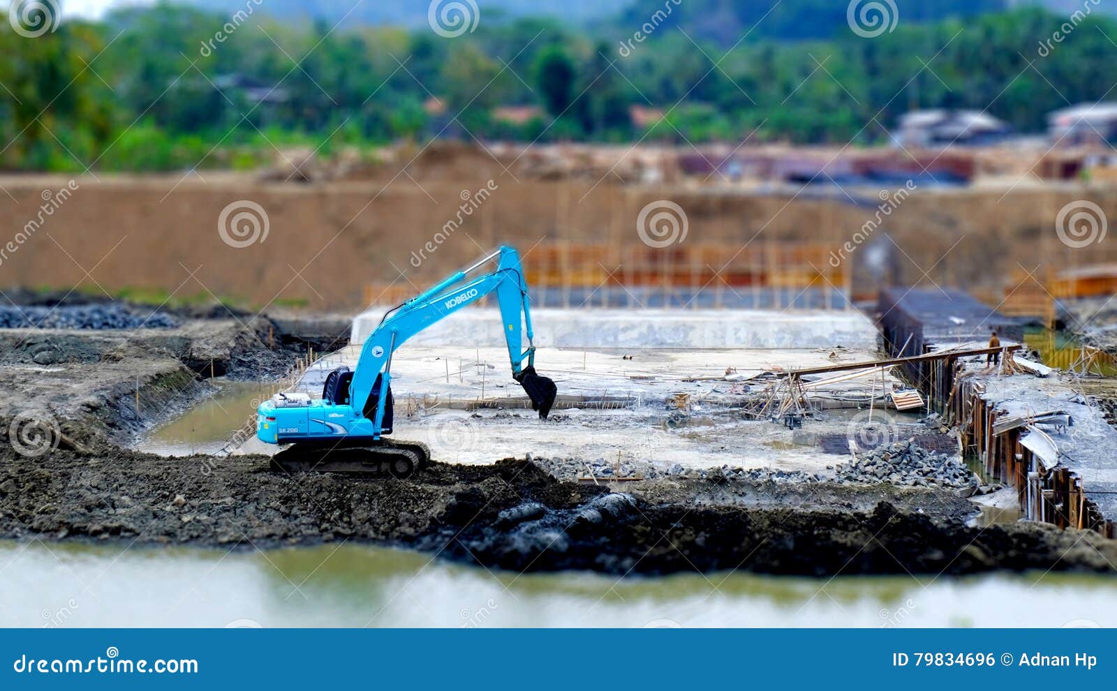 Blue Excavator in Construction Site Editorial Photo - Image of blue ...