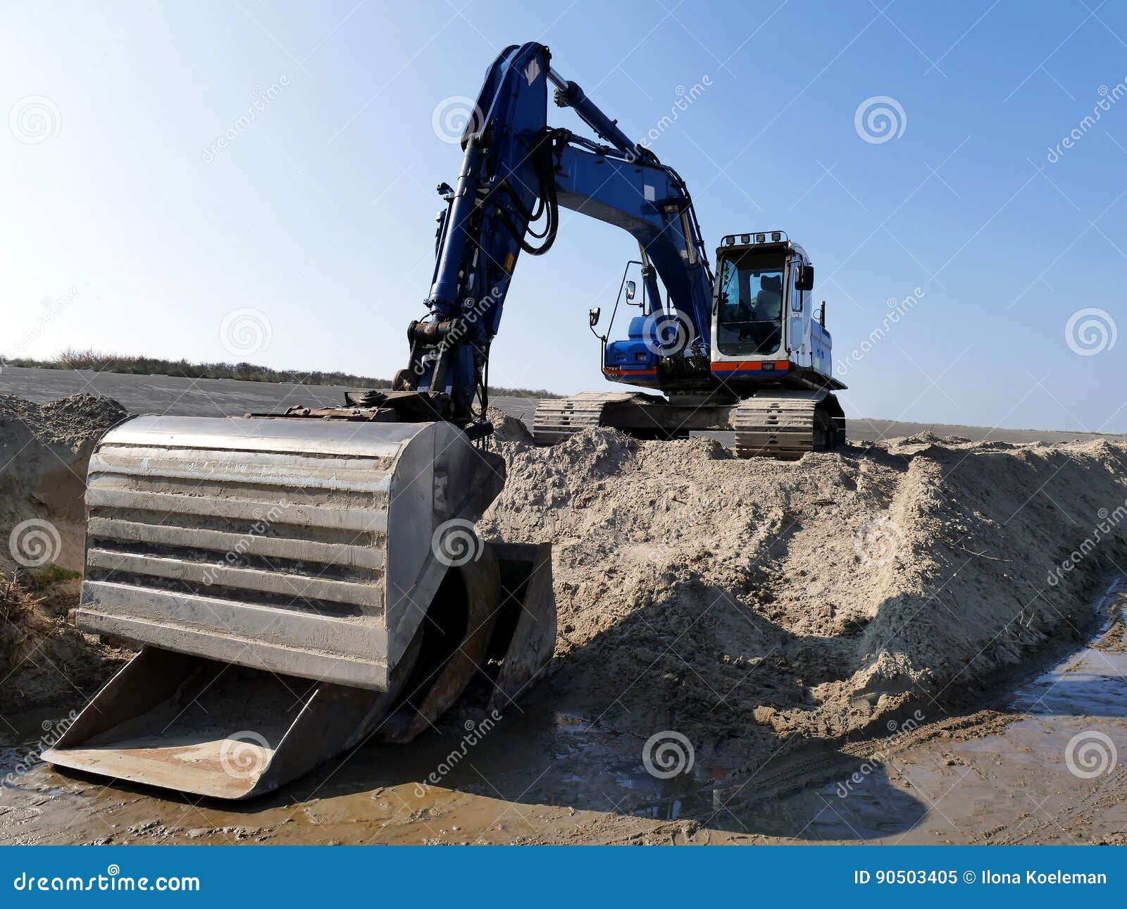 The Blue Excavator Has Black Smoke Produced By Incomplete Combustion ...
