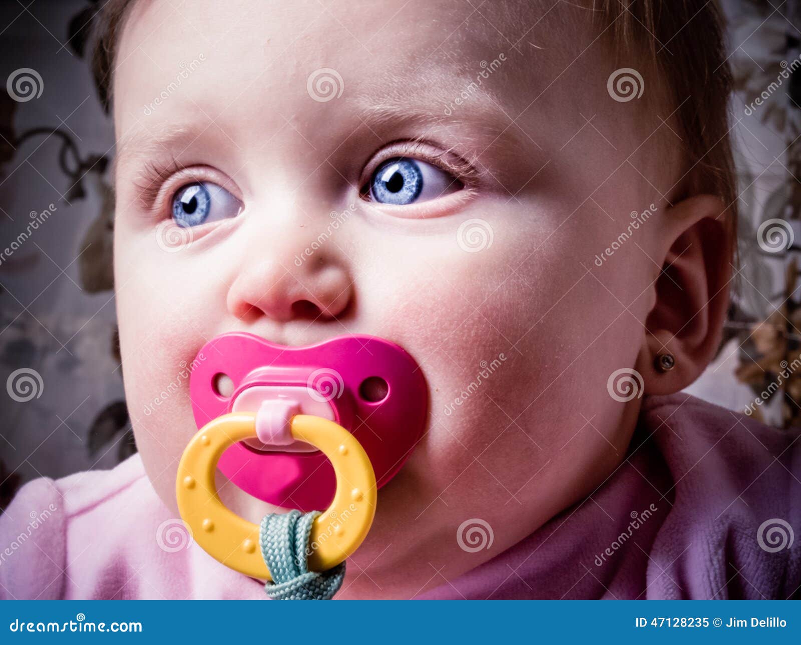Blue-eyed Baby Sucking Pacifier Stock Image - Image of face, infant ...
