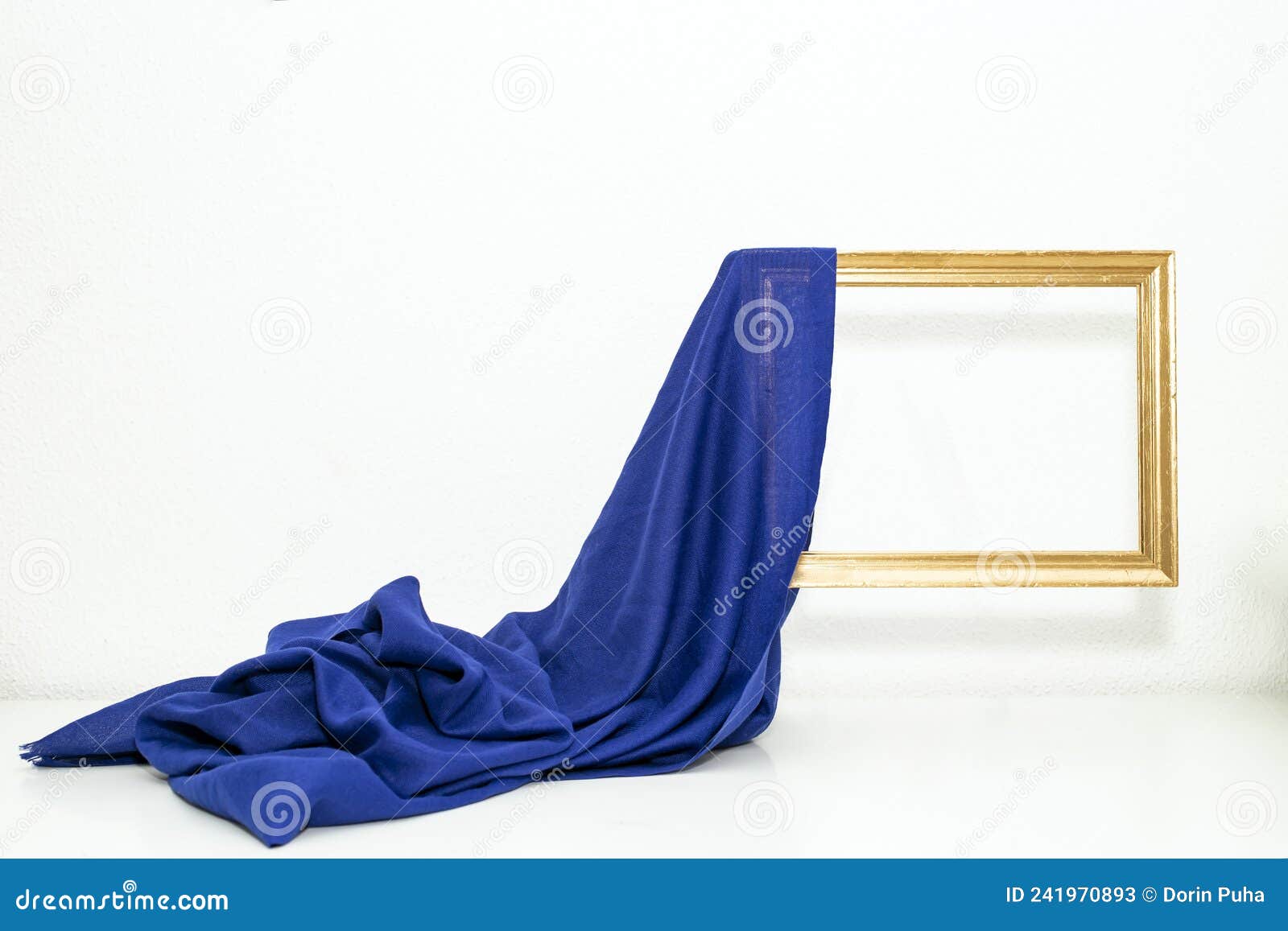 Blue Fabric Curtains Unveiling A Levitating Golden Empty Frame, On ...