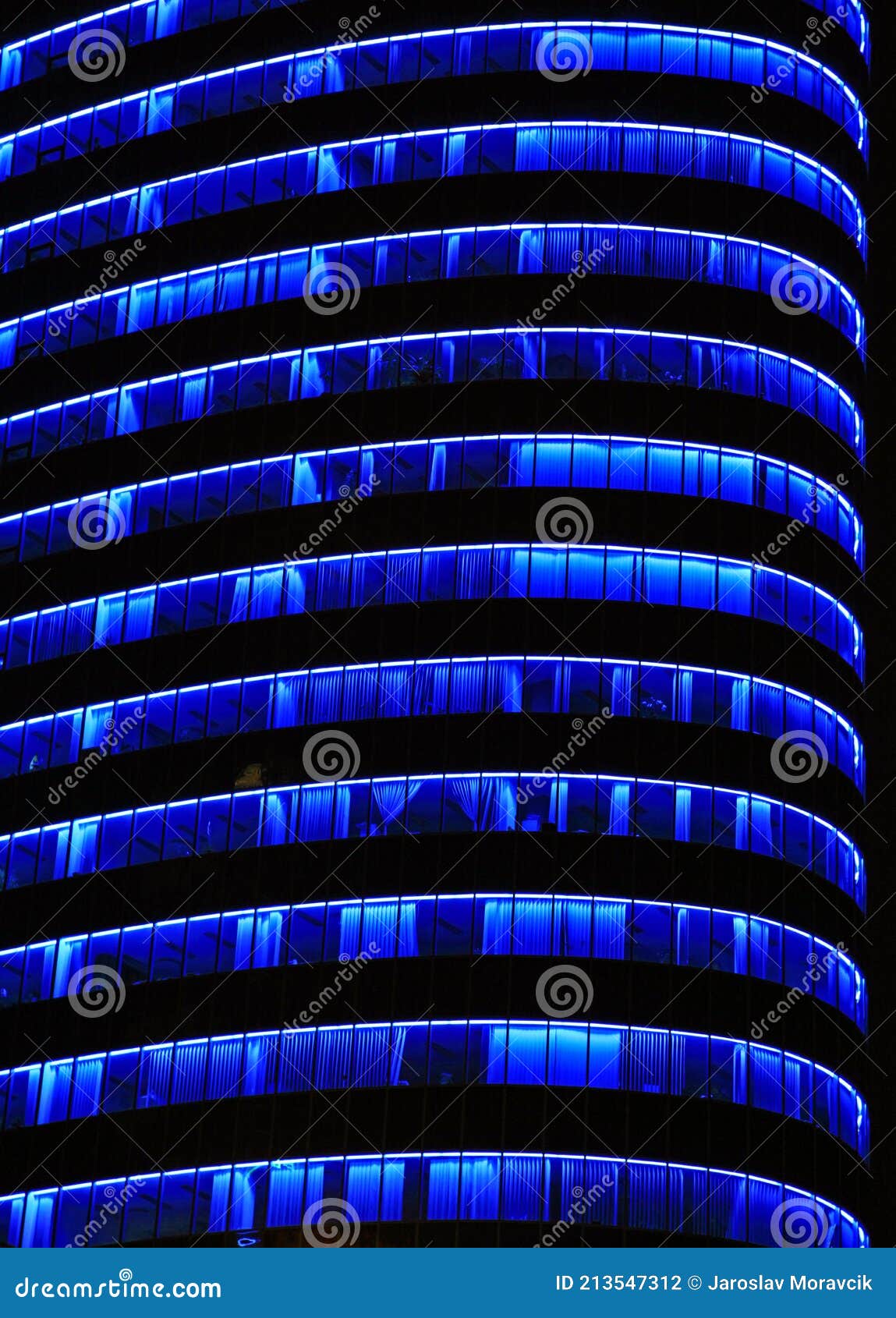 Blue Facade of Modern Skyscraper Building at Night Stock Photo - Image ...