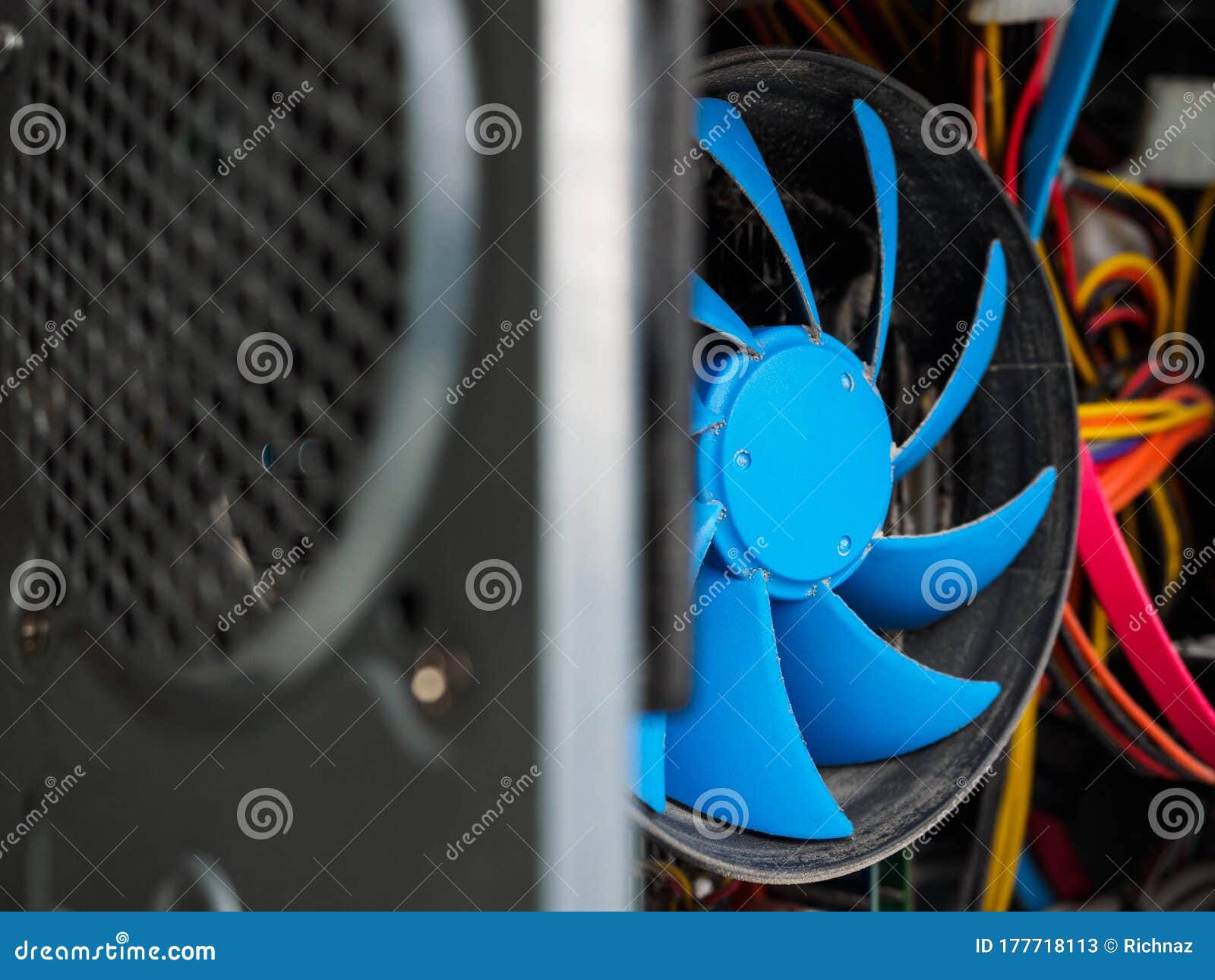 Blue Fan and Other Computer Boards in the Dust. Dusty the Insides of a ...