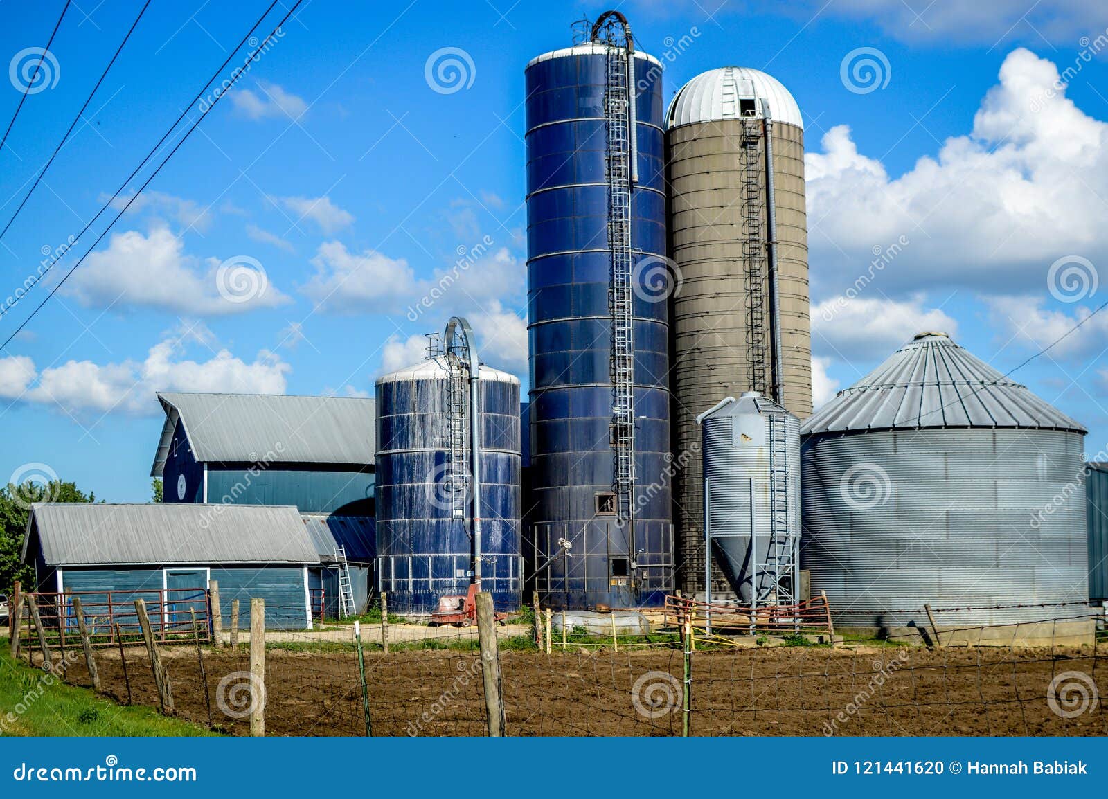 Blue Farm with Five Silos stock photo. Image of american - 121441620
