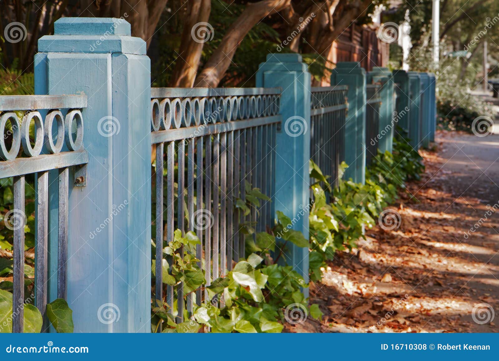 Blue Fence sidewalk stock photo. Image of protection - 16710308
