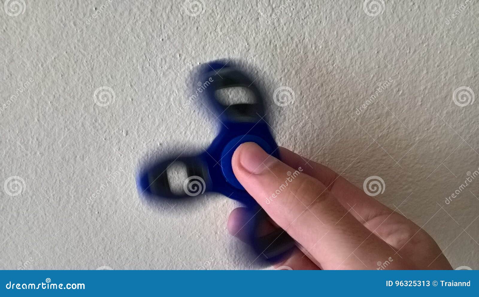 Blue Fidget Spinner Rolling Stock Image - Image of relaxing, rollingn ...