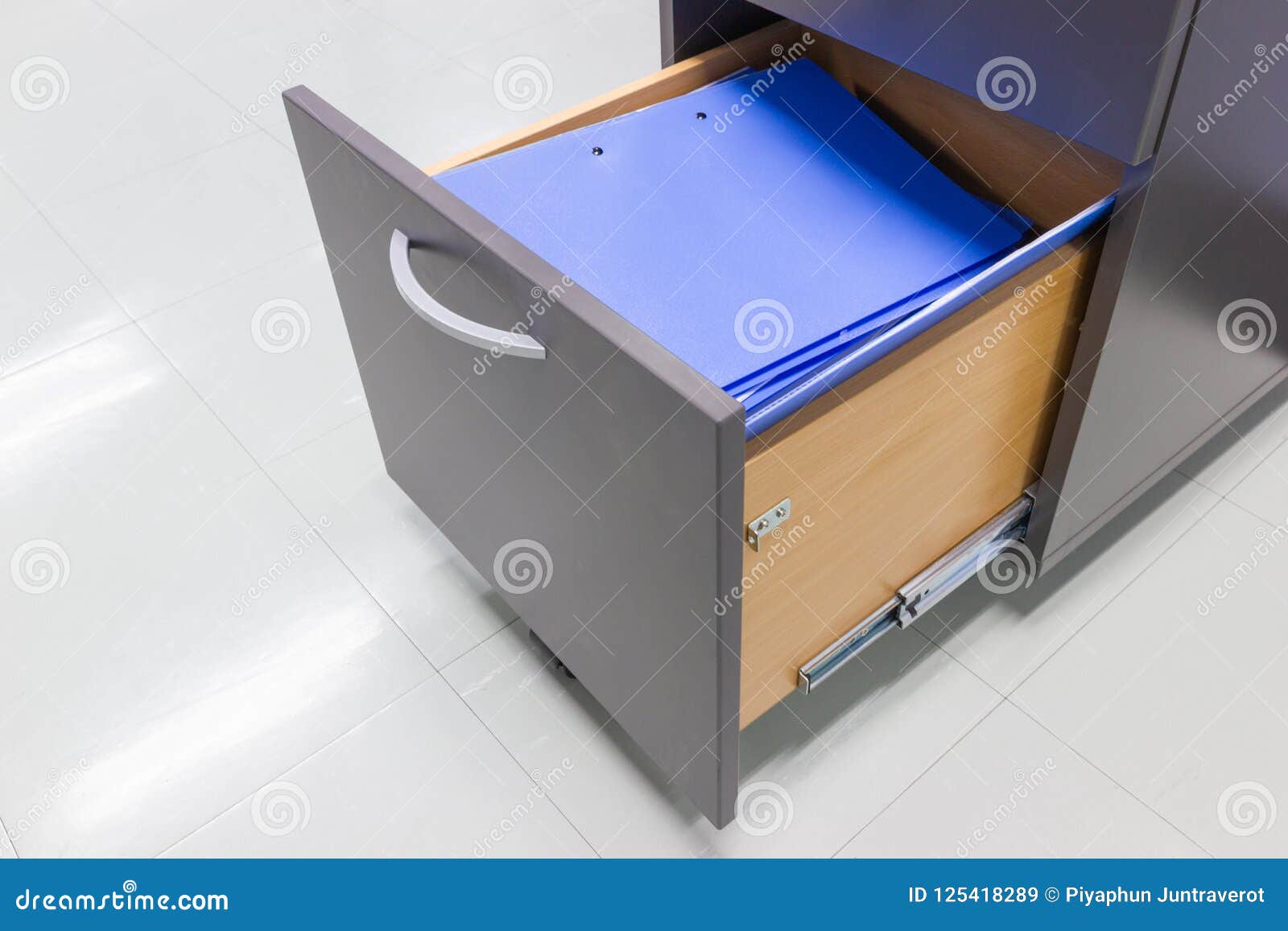 Blue File Folder Documents in a File Cabinet Retention Stock Image ...