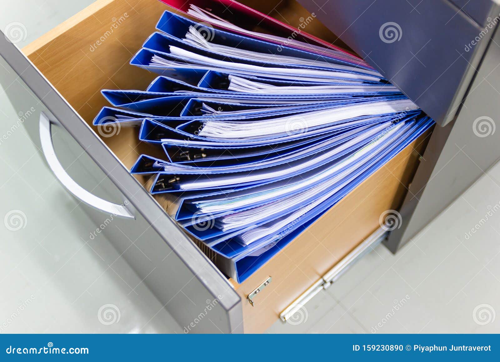 Blue File Folder Documents in a File Cabinet Retention Stock Photo ... Blue File Folder Documents in a File Cabinet Retention Stock Photo ...