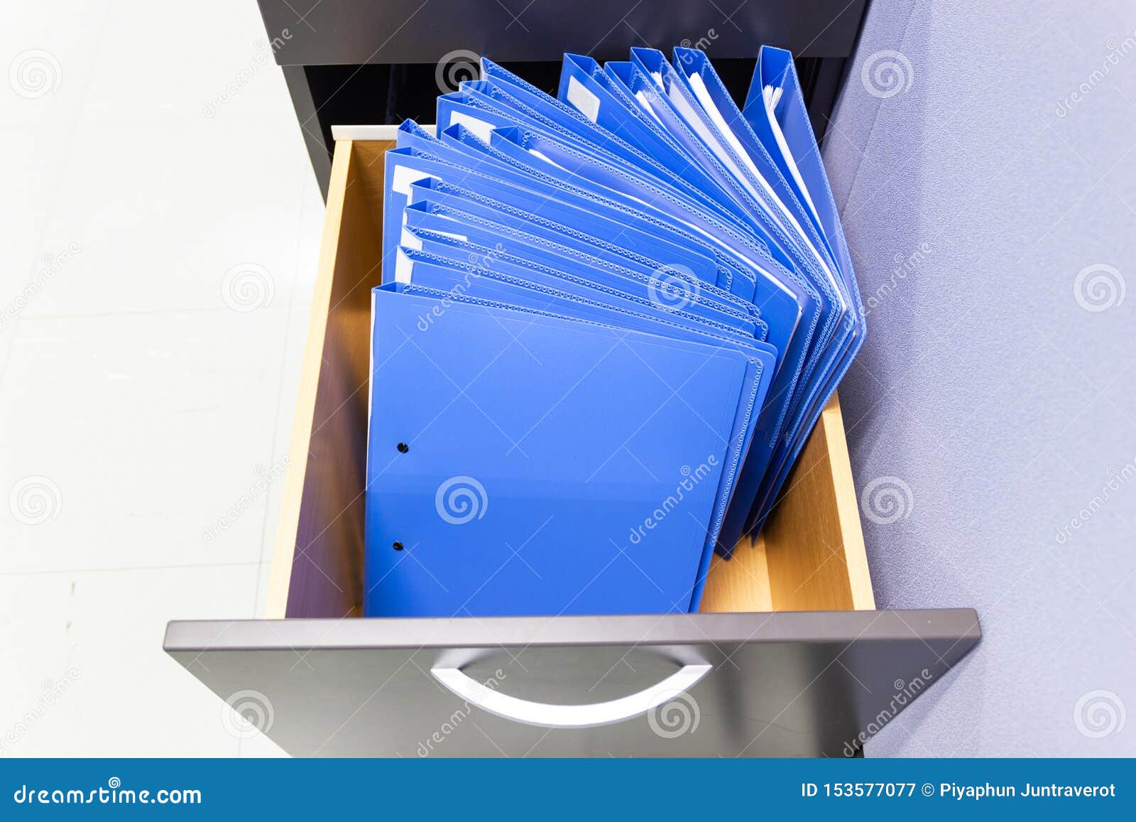Blue File Folder Documents in a File Cabinet Retention Stock Image ...