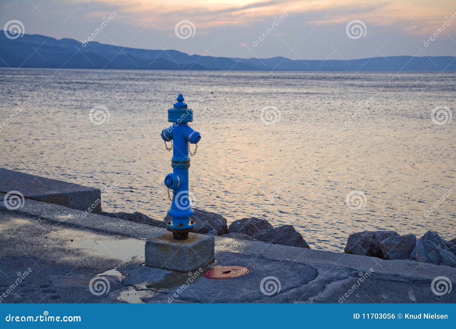 Blue fire hydrant stock photo. Image of water, sunset - 11703056