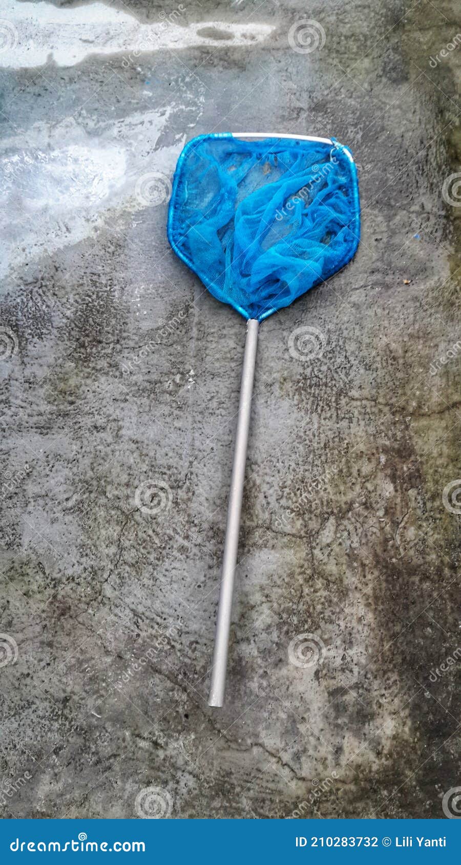 A Blue Fishing Net Lay on the Cement Floor Stock Photo - Image of iron ...