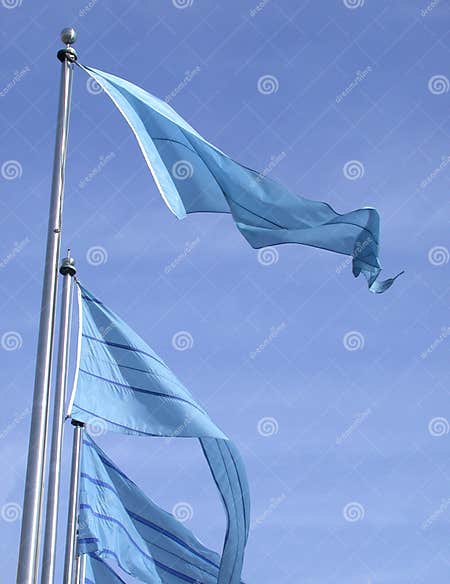 Blue flags on a blue sky stock image. Image of breezey, aqua - 3413