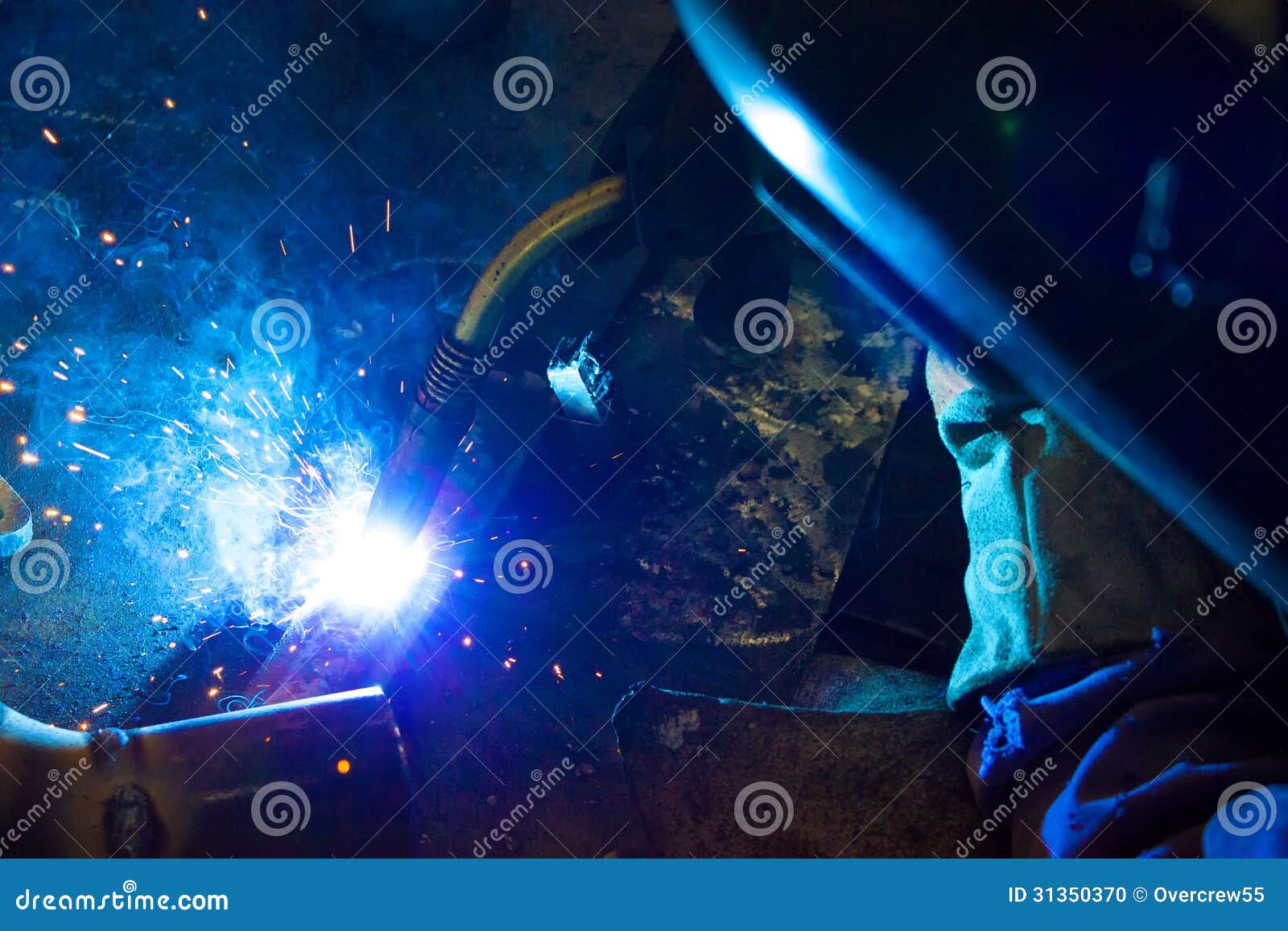 Blue flash welding stock photo. Image of mask, metal - 31350370