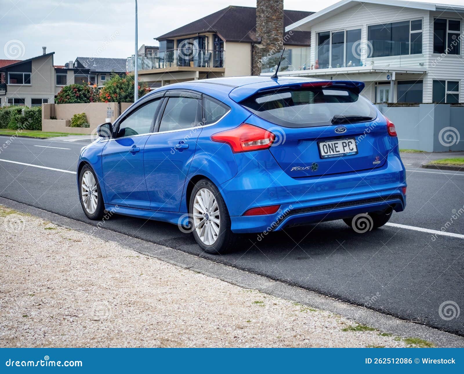 Blue Ford Focus on Road Side Editorial Photo - Image of suburb, style ...