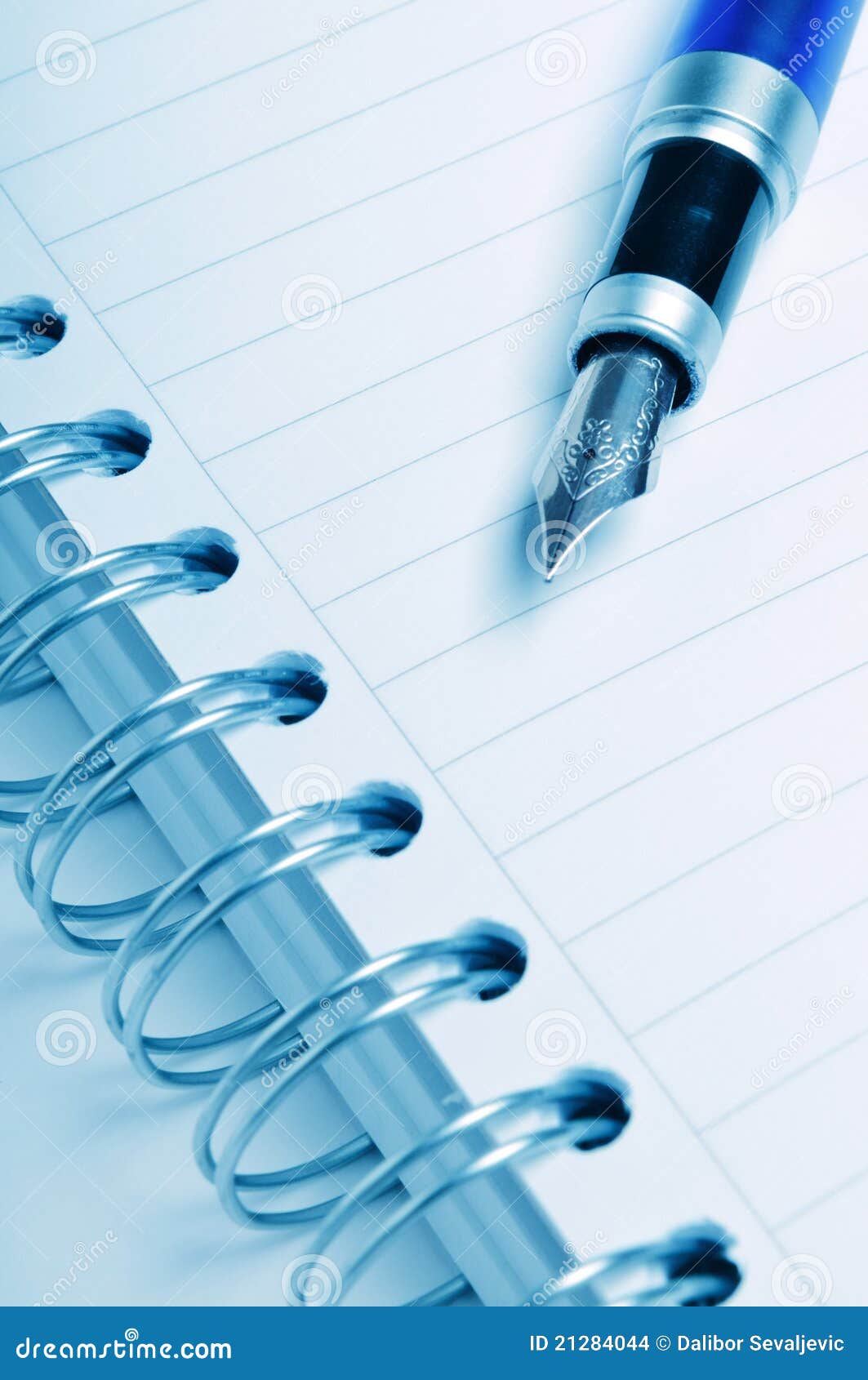 Blue Fountain Pen on Notebook Stock Photo - Image of fountain, agenda ...