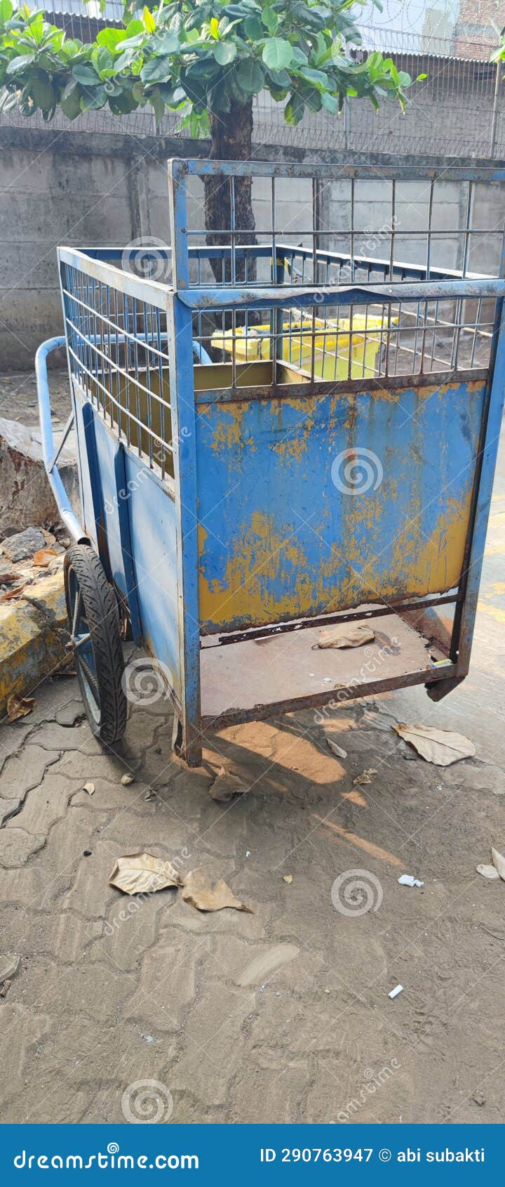 BLUE GARBAGE CART WHICH is STILL EMPTY and READY TO USE Stock Image ...