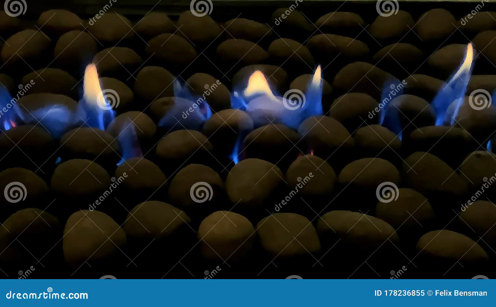 Blue Gas Fire Roaring through Small Stones Stock Image - Image of ...