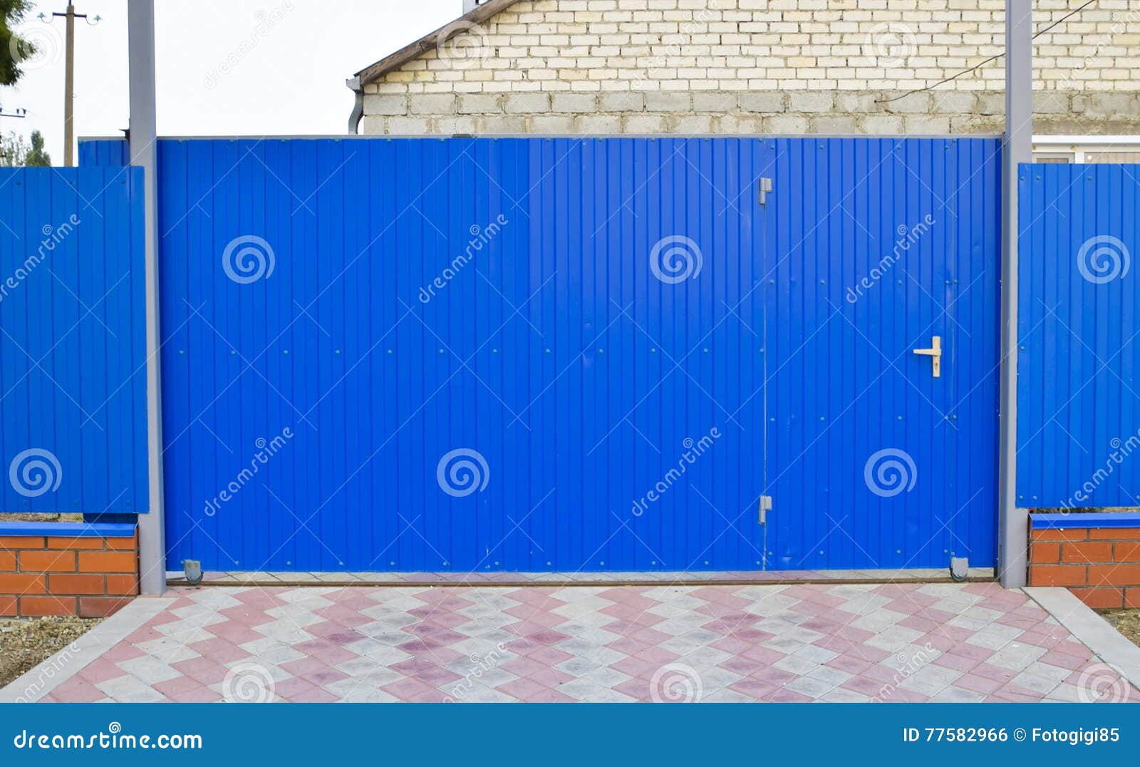 Blue gate and fence stock photo. Image of building, gate - 77582966