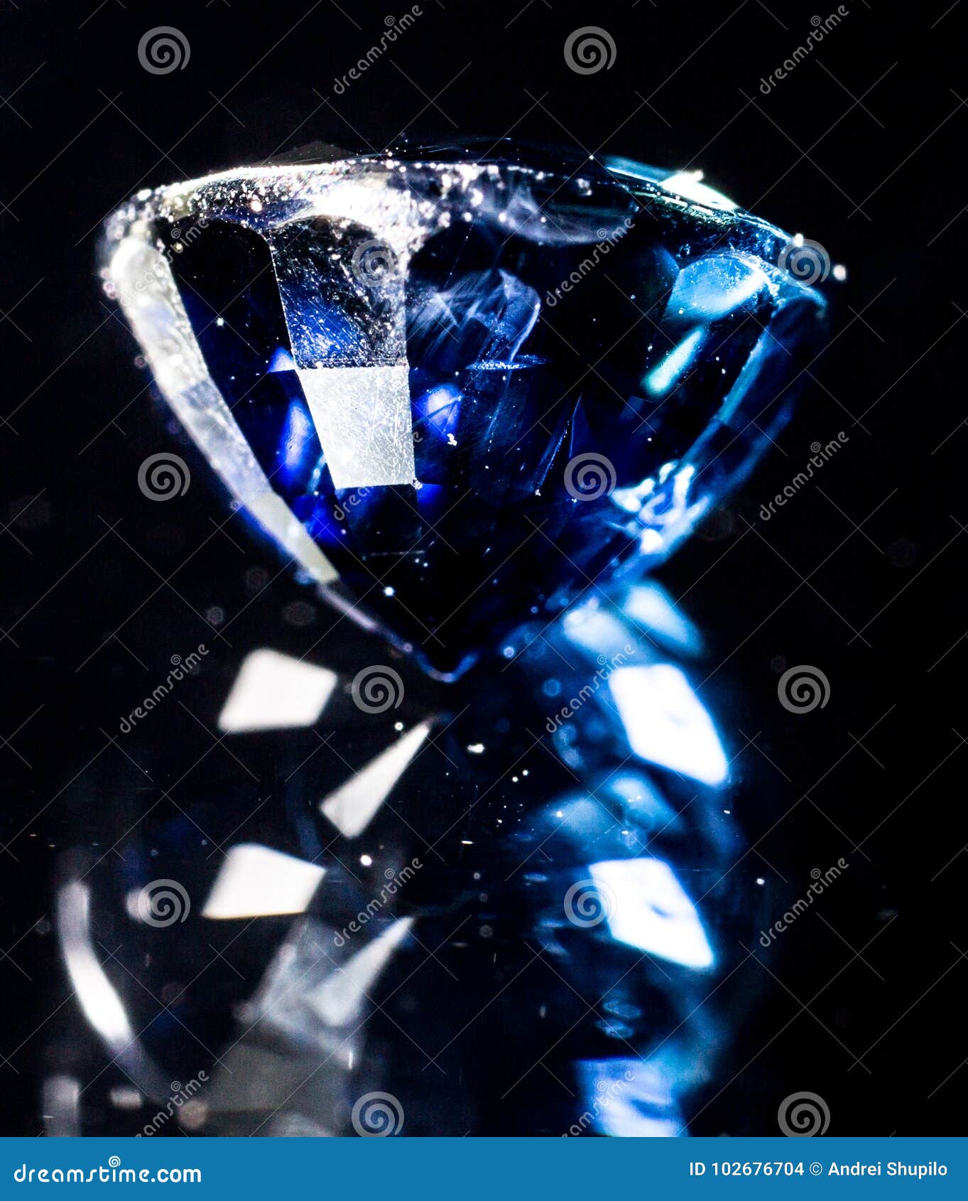 A Blue Gem on a Black Background Stock Photo - Image of stone, closeup ...