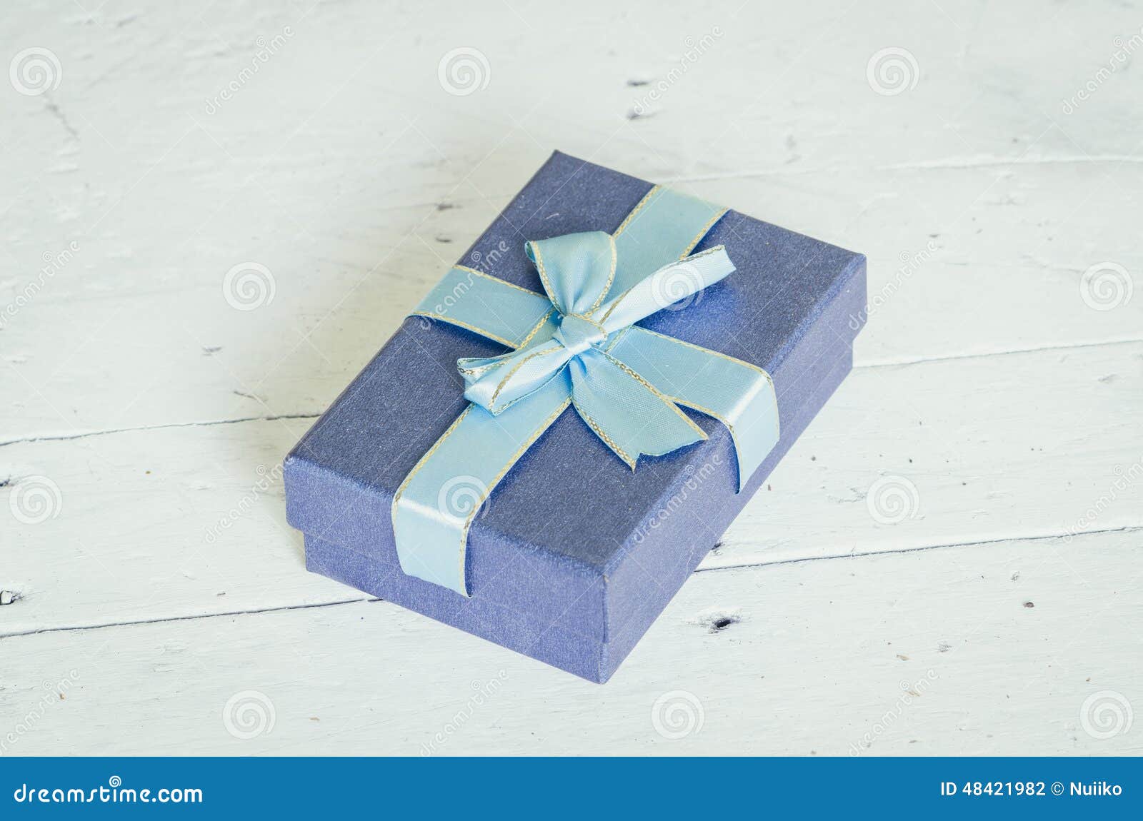 Blue Gift Box on Wooden Table, Stock Photo - Image of small, blue: 48421982