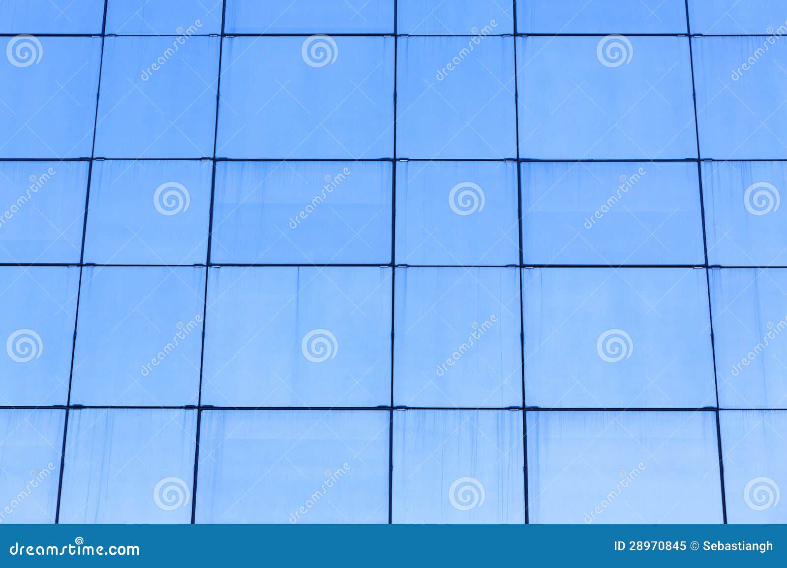 Blue glass building facade stock image. Image of pane - 28970845