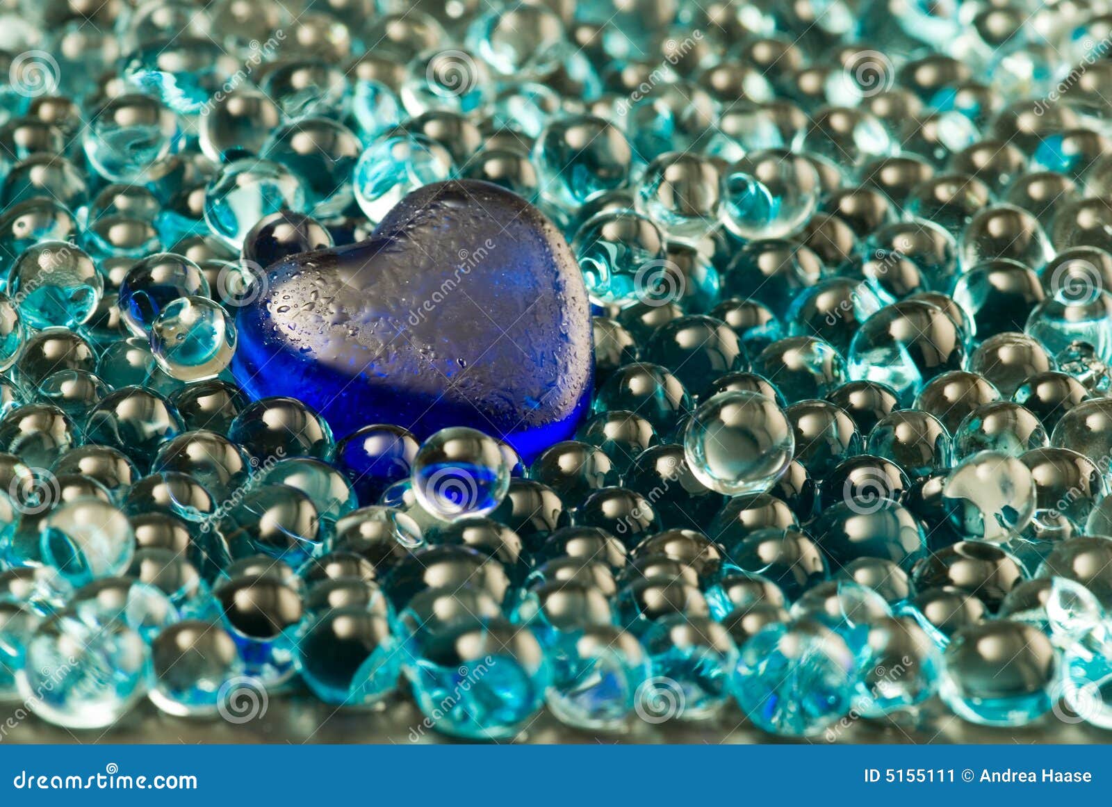 Blue glass heart and beads stock image. Image of valentine - 5155111