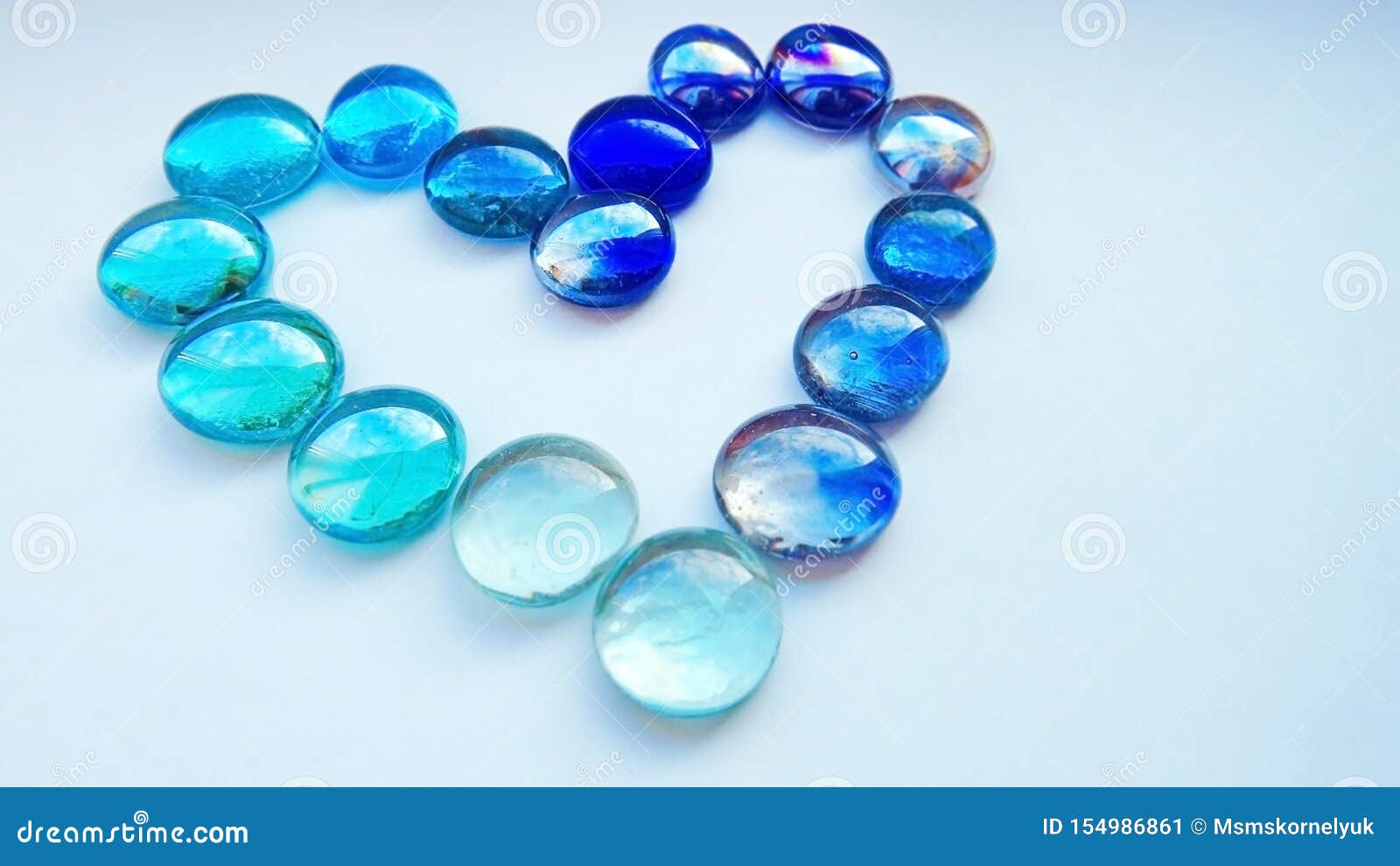 Blue glass heart stock image. Image of transparent, love - 154986861