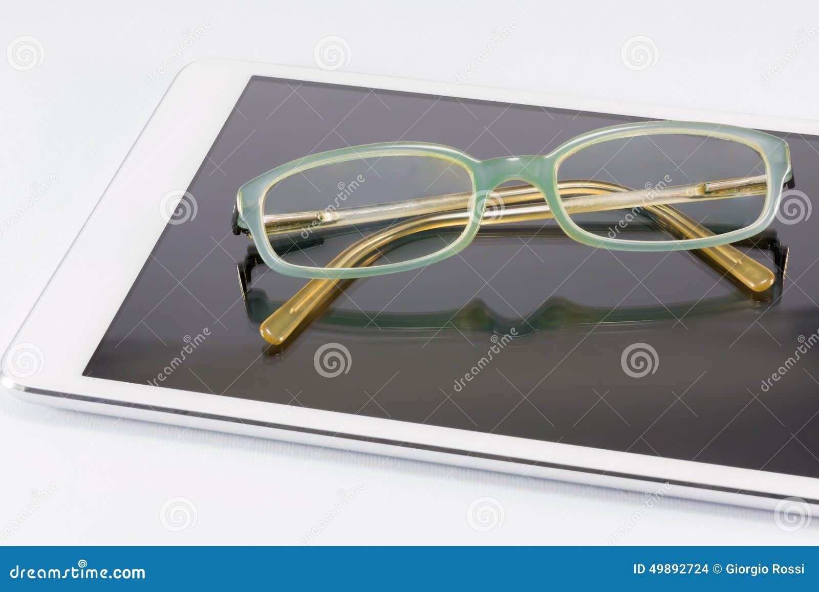 Blue Glasses on Digital Tablet Pc Stock Photo - Image of technology ...