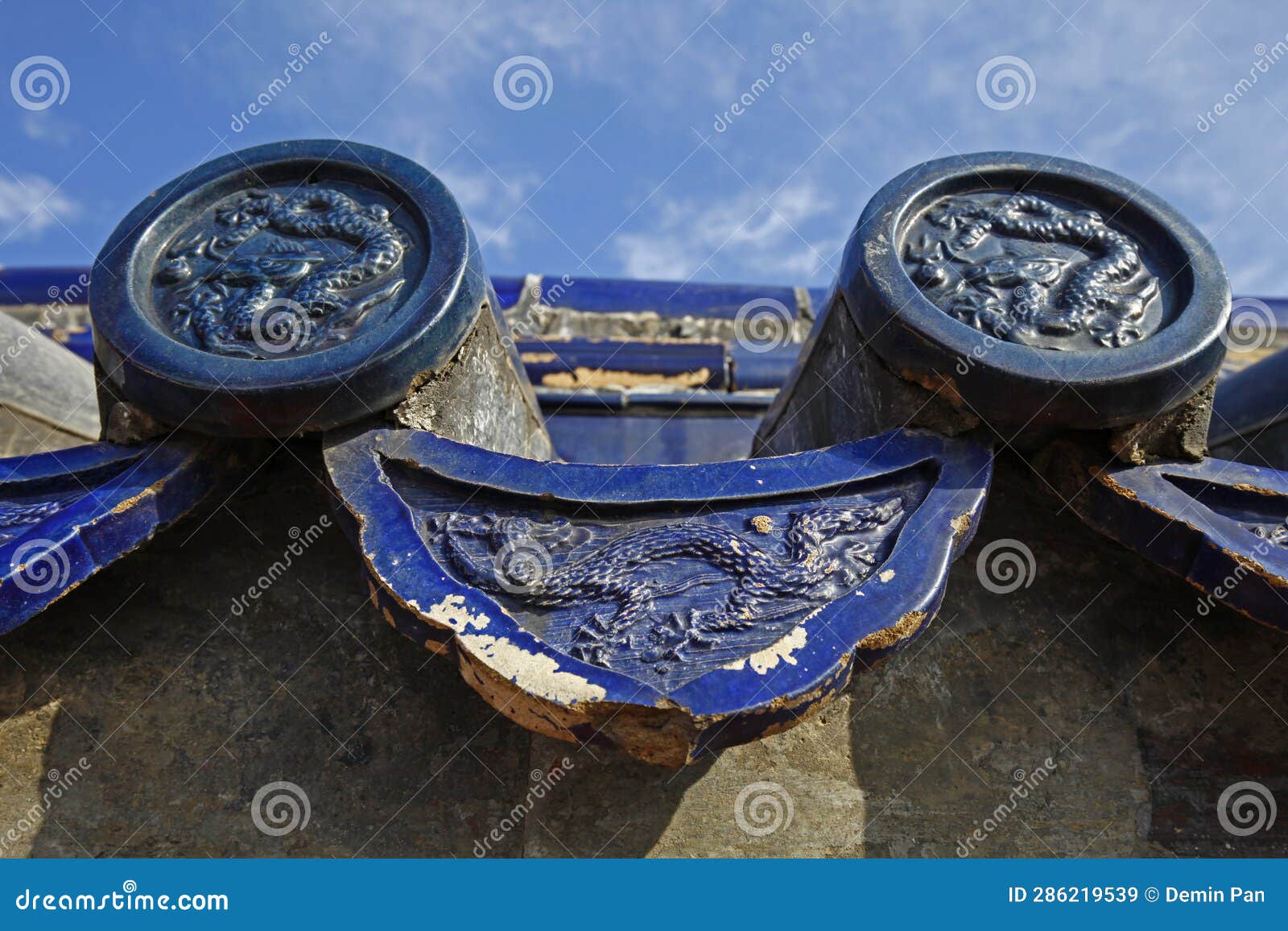 The Blue Glazed Tiles on the Wall As the Background, the Traditional ...
