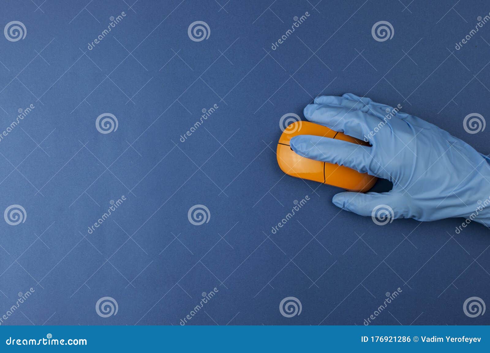 Blue Glove and Computer Mouse on Blue Background Stock Photo - Image of ...
