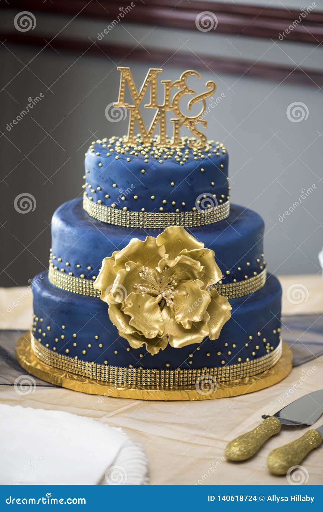 Blue and gold cake stock photo. Image of sweettooth - 140618724