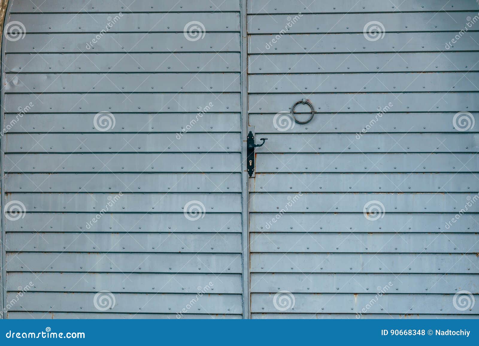 A Blue-gray Metal Gate in a Stone Fence Stock Photo - Image of metal ...