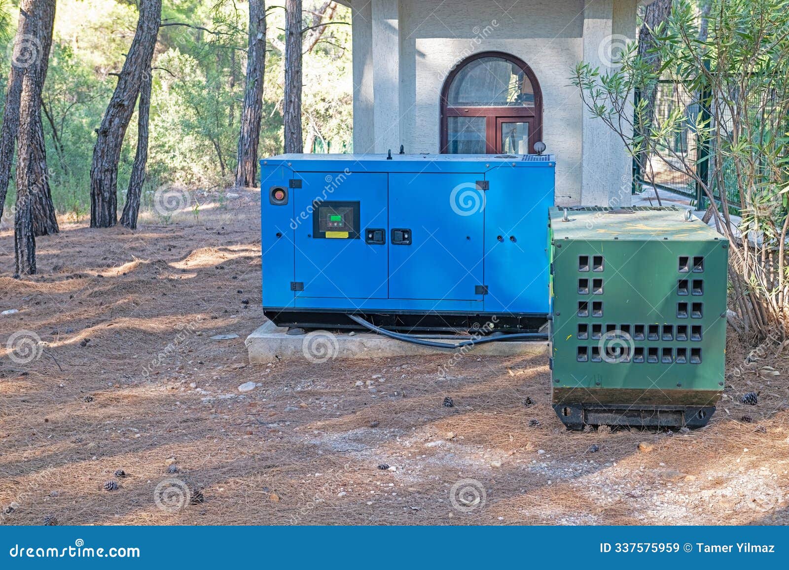 Blue and Green Coloured Generators Installed in a Plant. Alternative ...