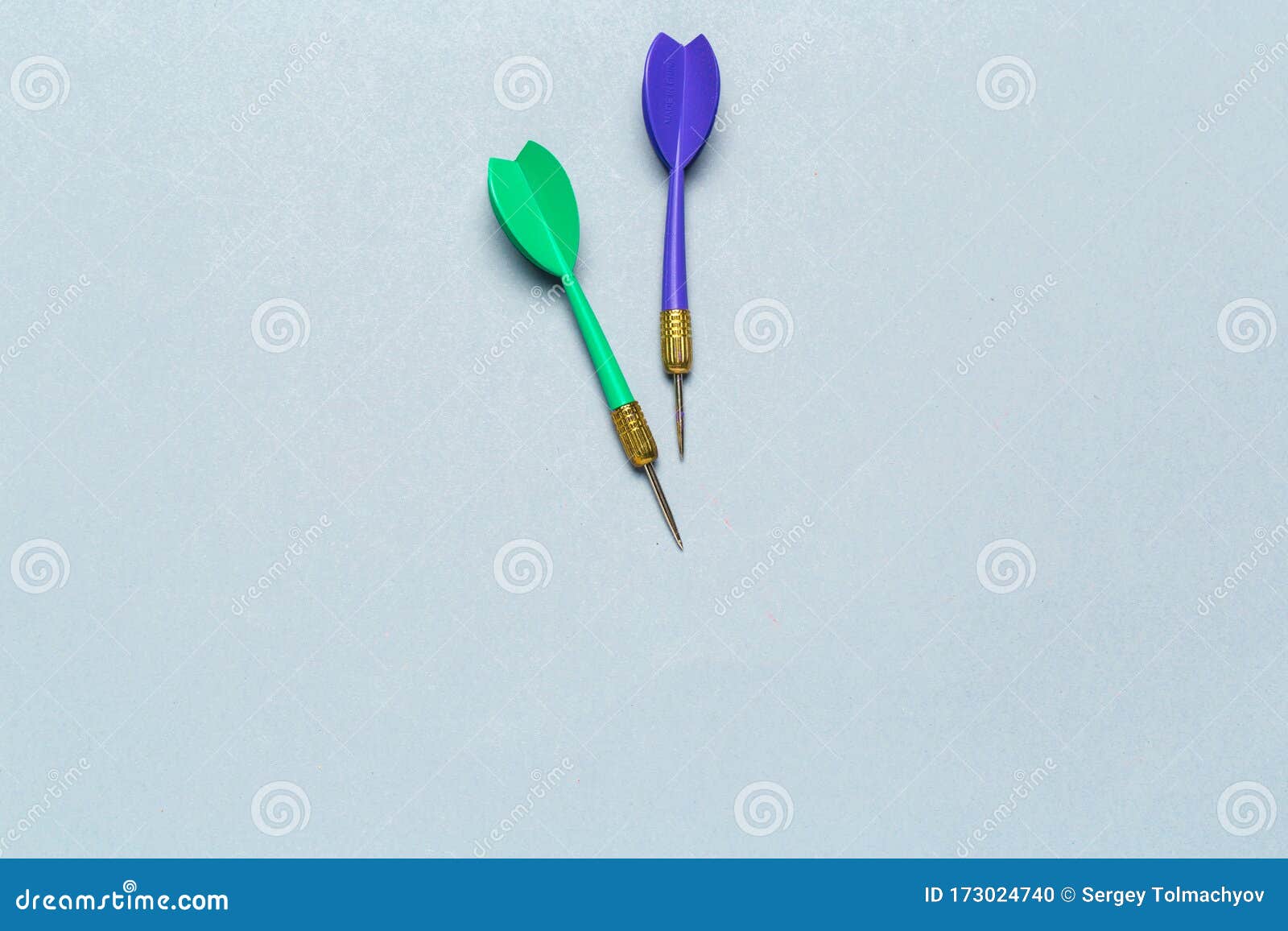 Blue and Green Darts Arrows on Light Gray Background Stock Photo ...