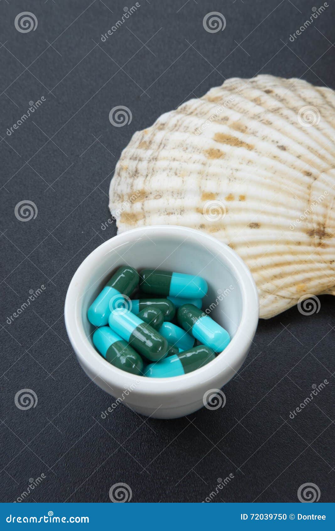 Blue green round capsule stock photo. Image of painkiller - 72039750