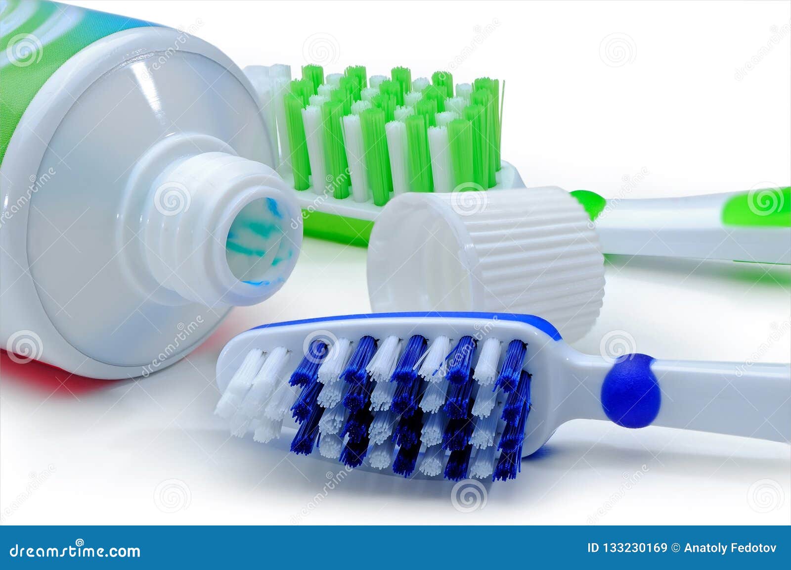 Blue, Green Toothbrushes and Toothpaste are Isolated on a White Stock ...