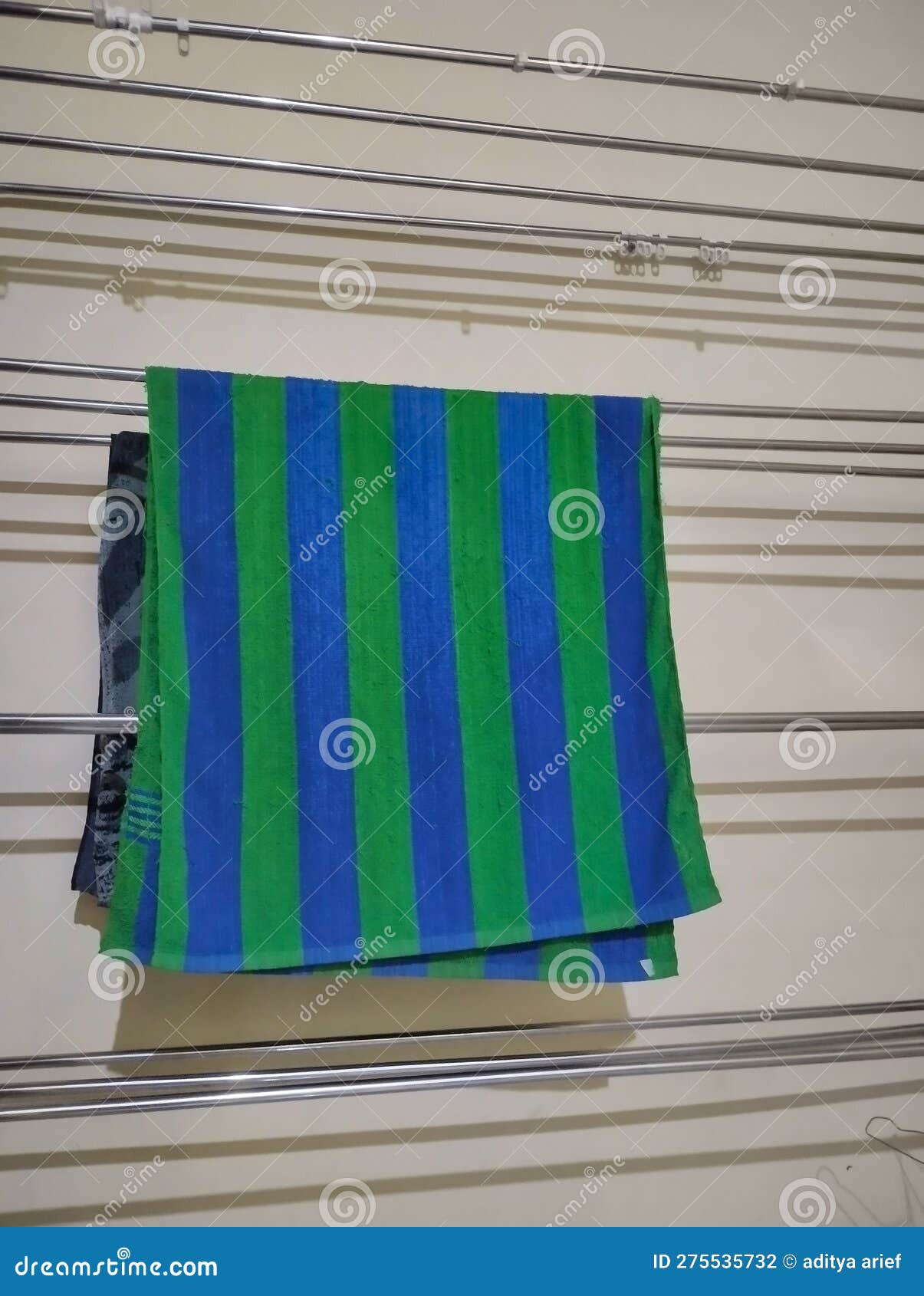 Blue Green Towels Drying on Stainless Hangers Stock Photo - Image of ...