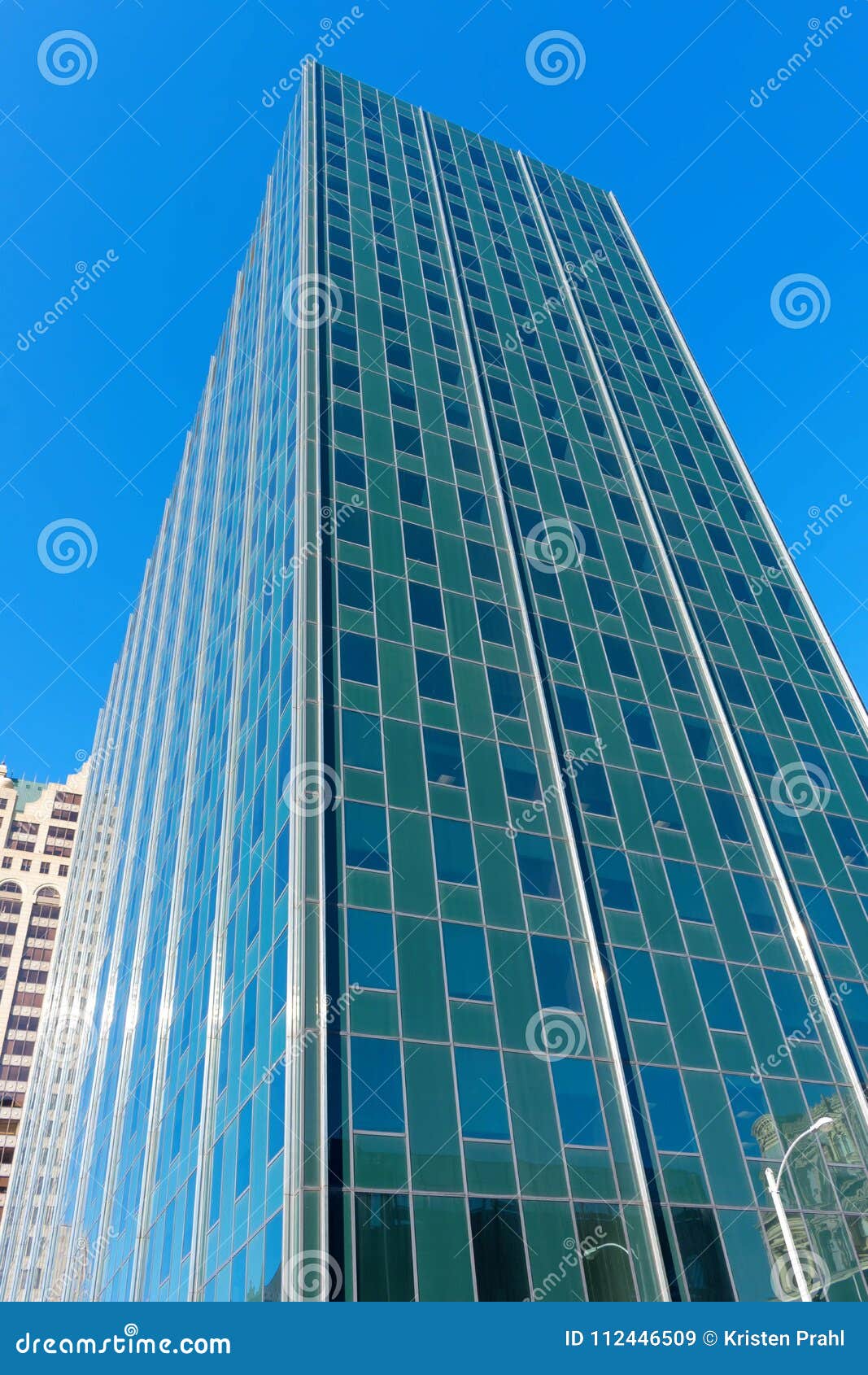 Blue and Green Windows Form a Pattern on Highrise Building Stock Image ...