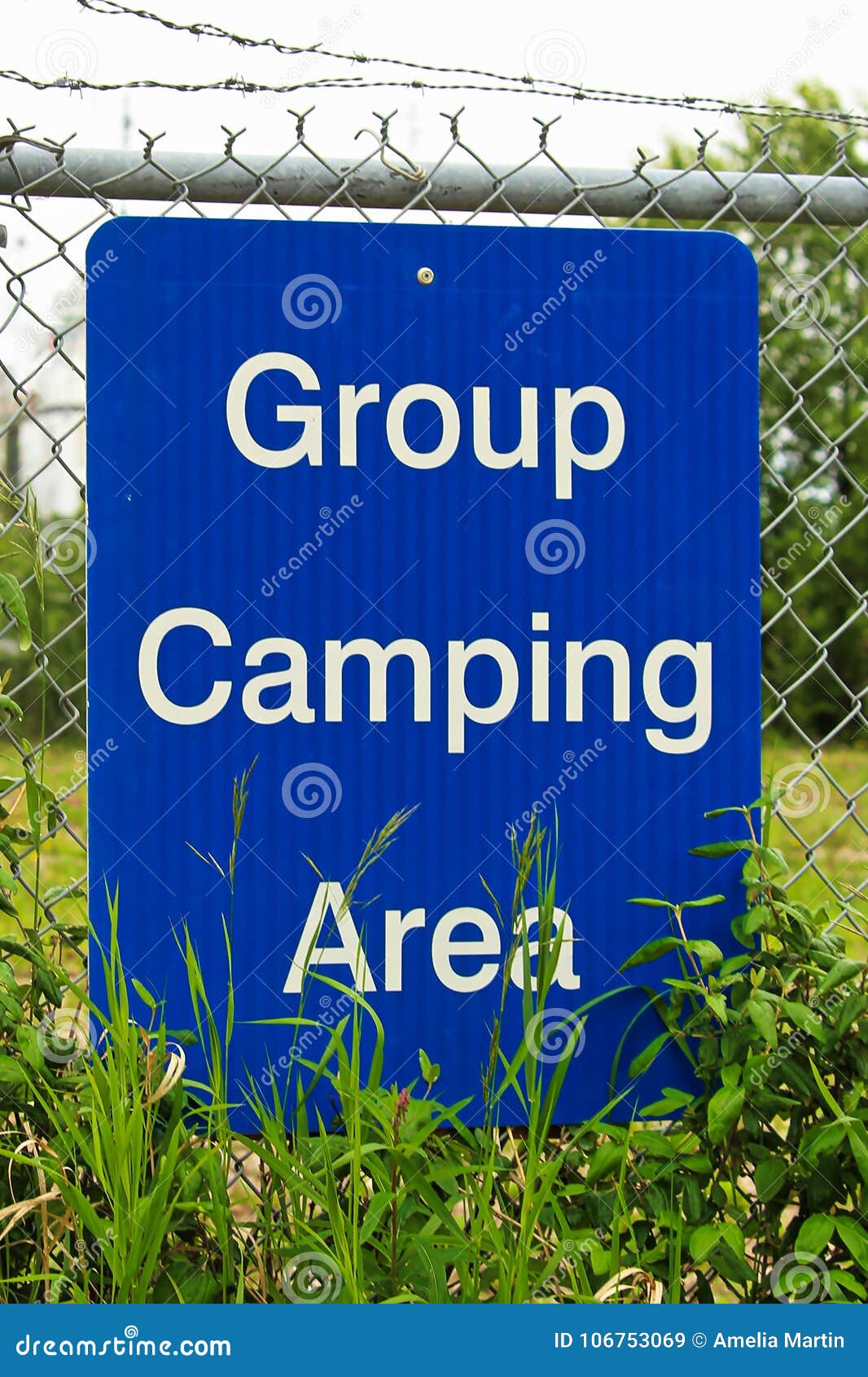 A Blue Group Camping Area Sign on a Fence Stock Image - Image of public ...