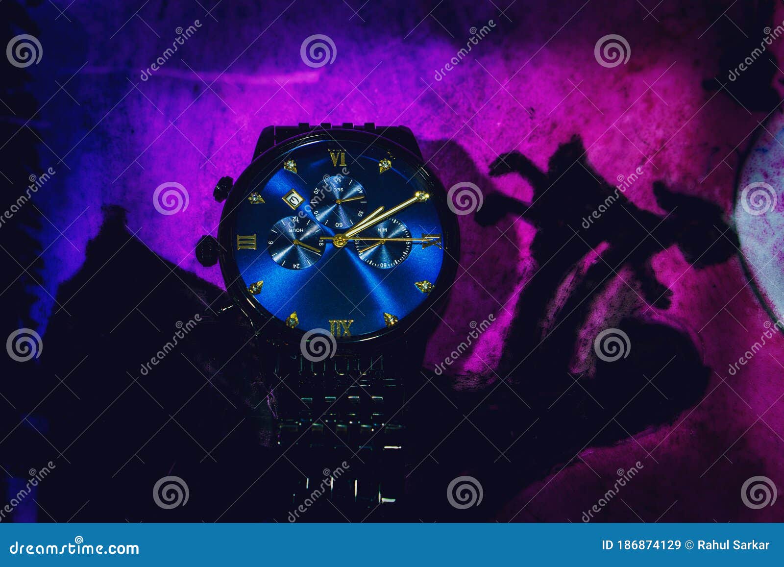 Blue Hand Watch on a Pink and Blue Texture Stock Image - Image of black ...