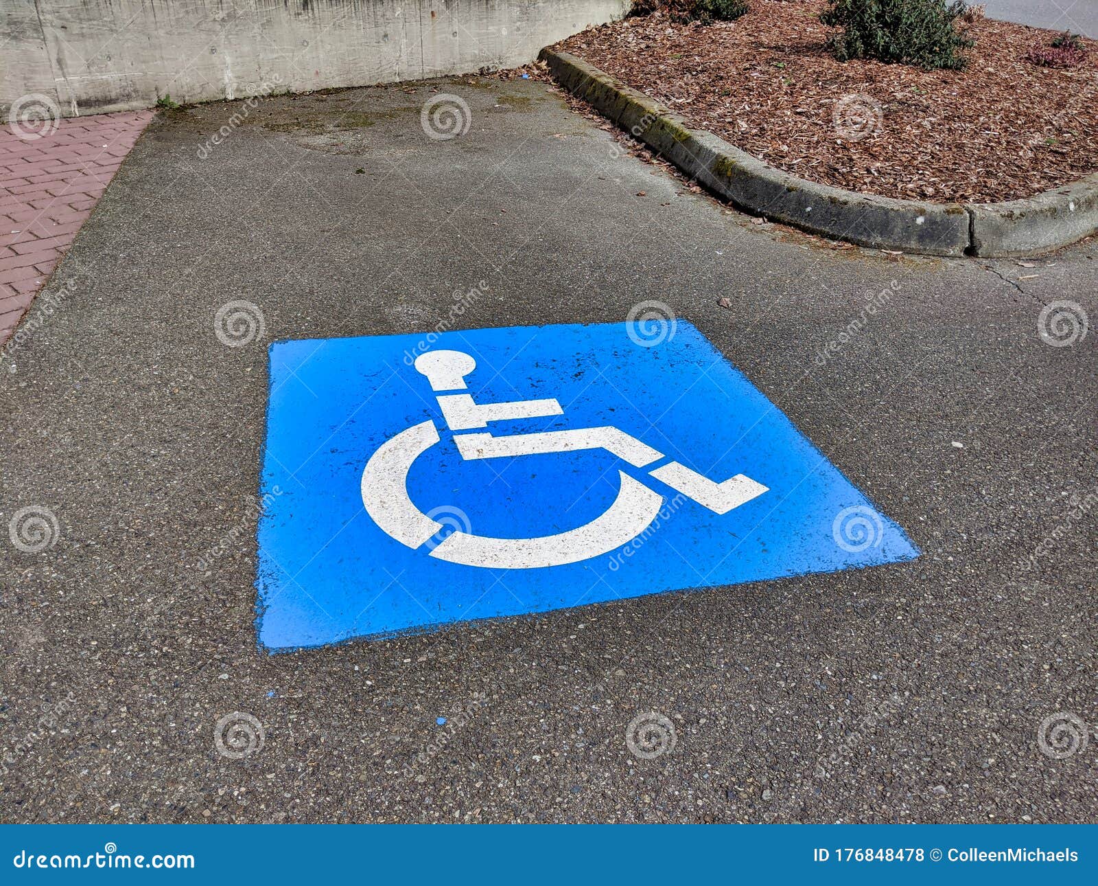 Blue Handicapped Parking Paint Marker in a Parking Lot Outdoors Stock ...