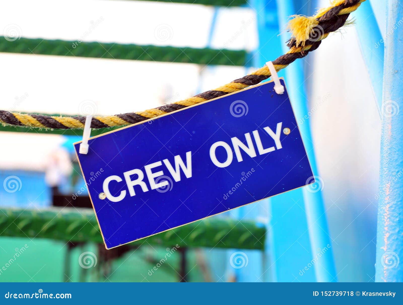 Blue Hanging Sign with Crew only Words Stock Photo - Image of crew ...