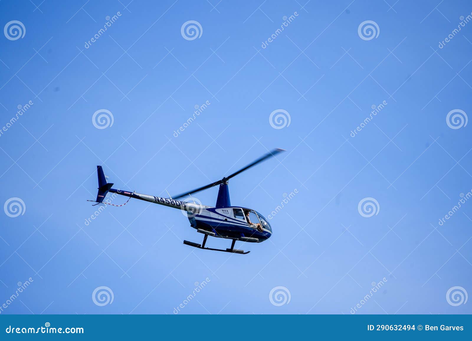 Blue Helicopter Crosses Sky Stock Photo - Image of bell, cockpit: 290632494