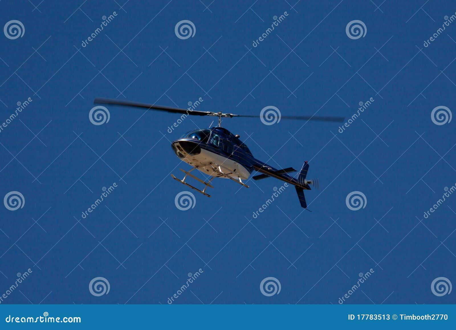 Blue helicopter in flight editorial stock photo. Image of power - 17783513